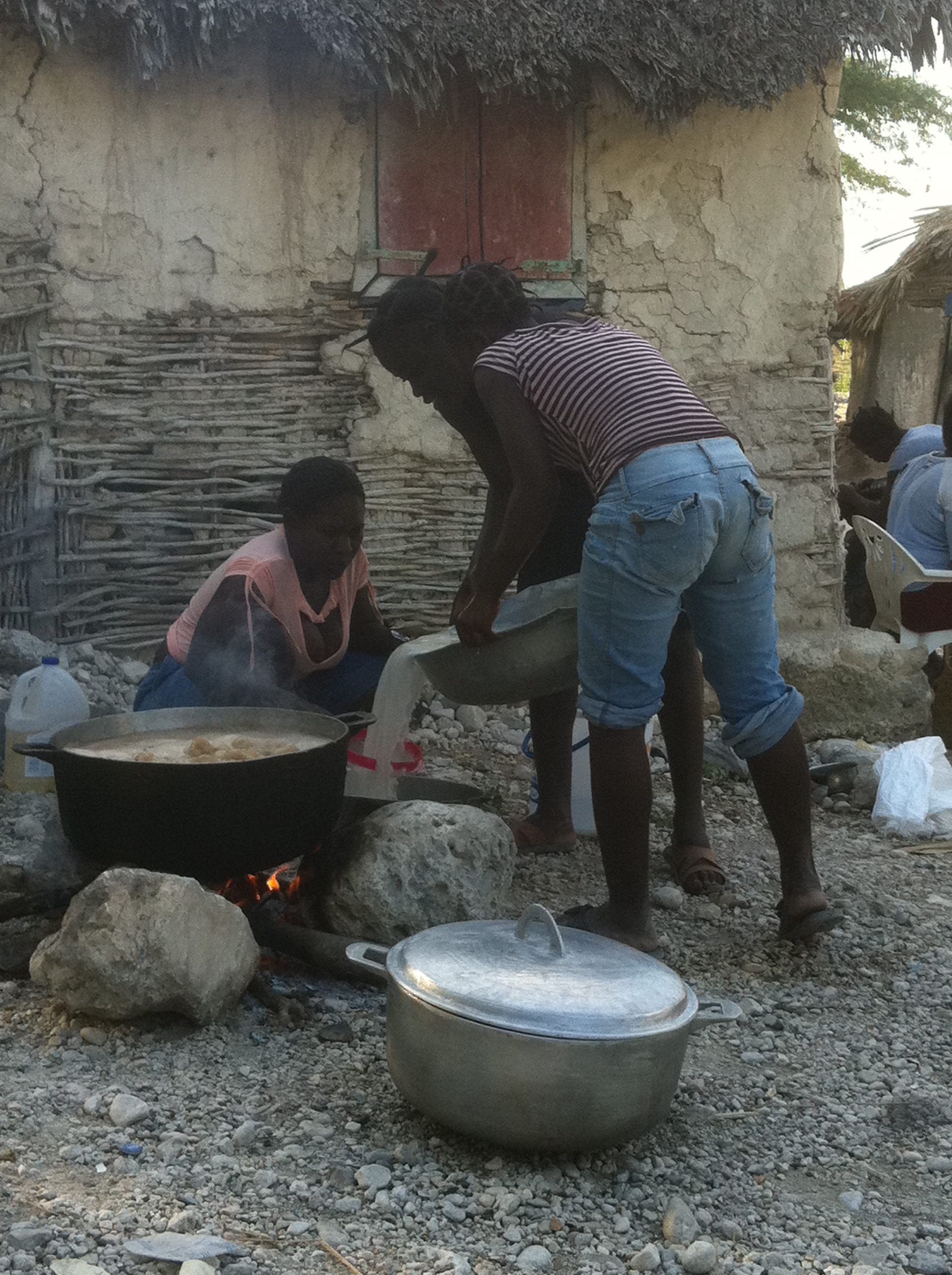 Cooking the meal at the village – JUST MERCY
